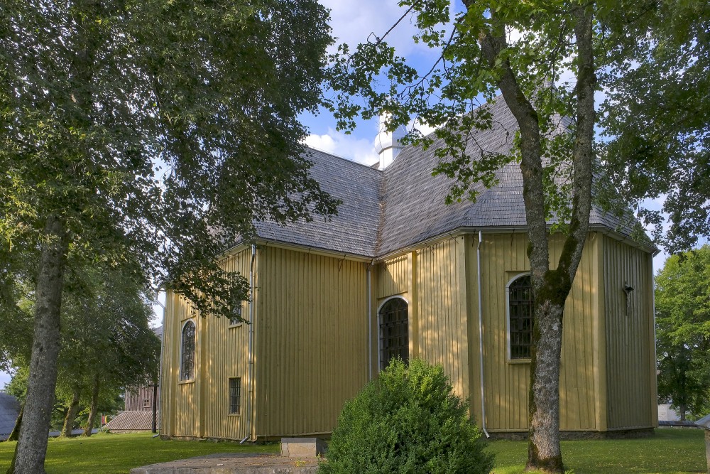 Plateliai St Peter and Paul Church wooden building surrounded by trees ...