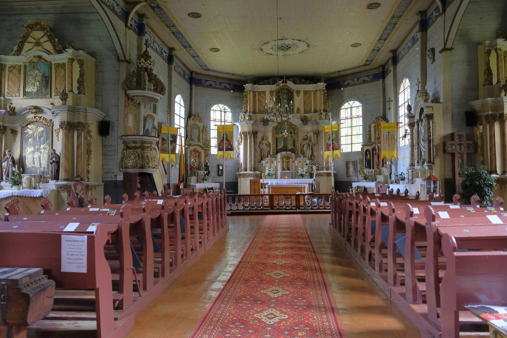 Interior of Plateliai St Peter and Paul Church with altar and wooden ...