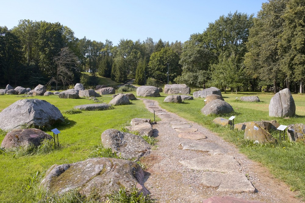 Wide boulder landscape with path in Vaclovas Intas stone park - redzet.lv