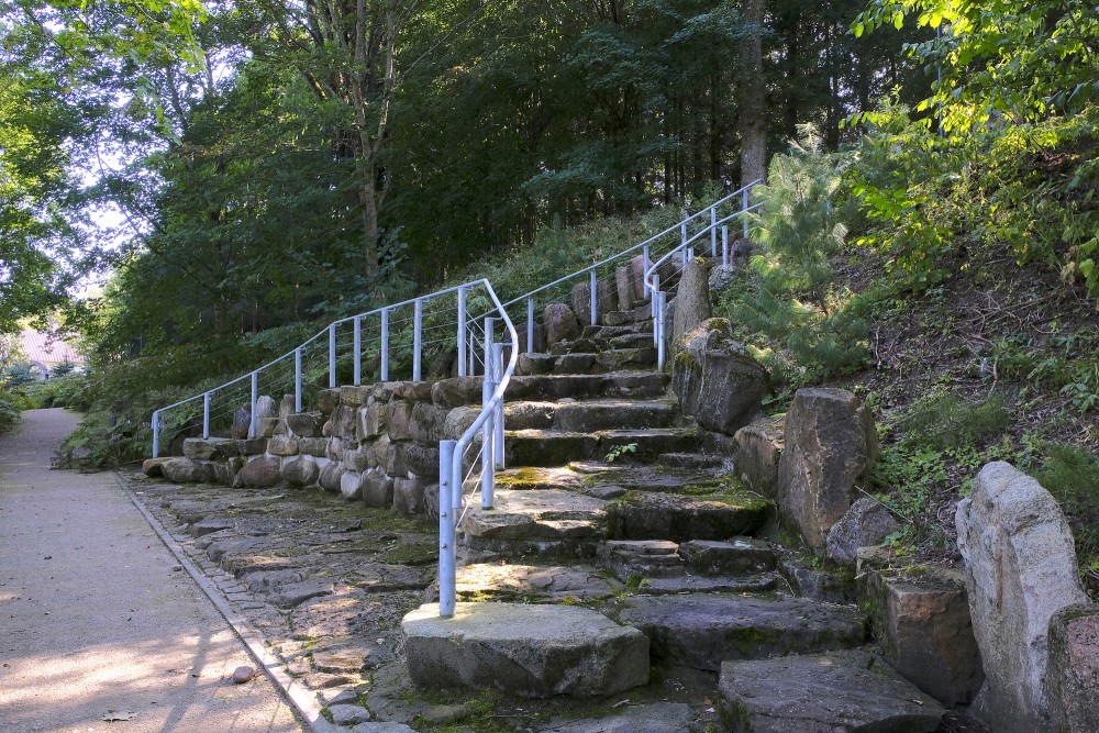 Stone arches and boulders in a stone museum park landscape - redzet.lv