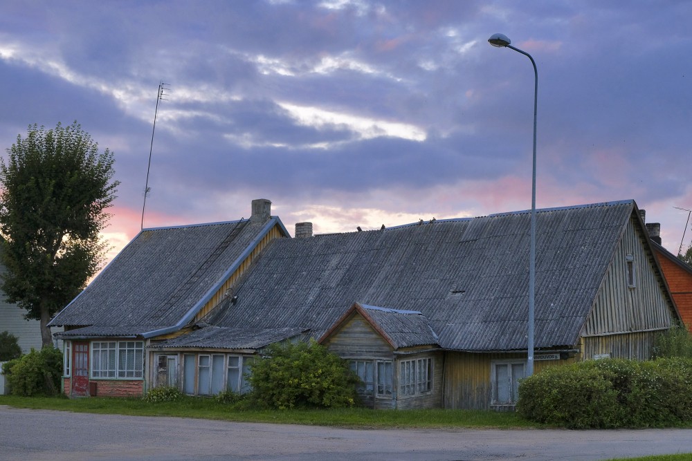 Varduva river canal by Seda watermill at sunset with pink clouds ...